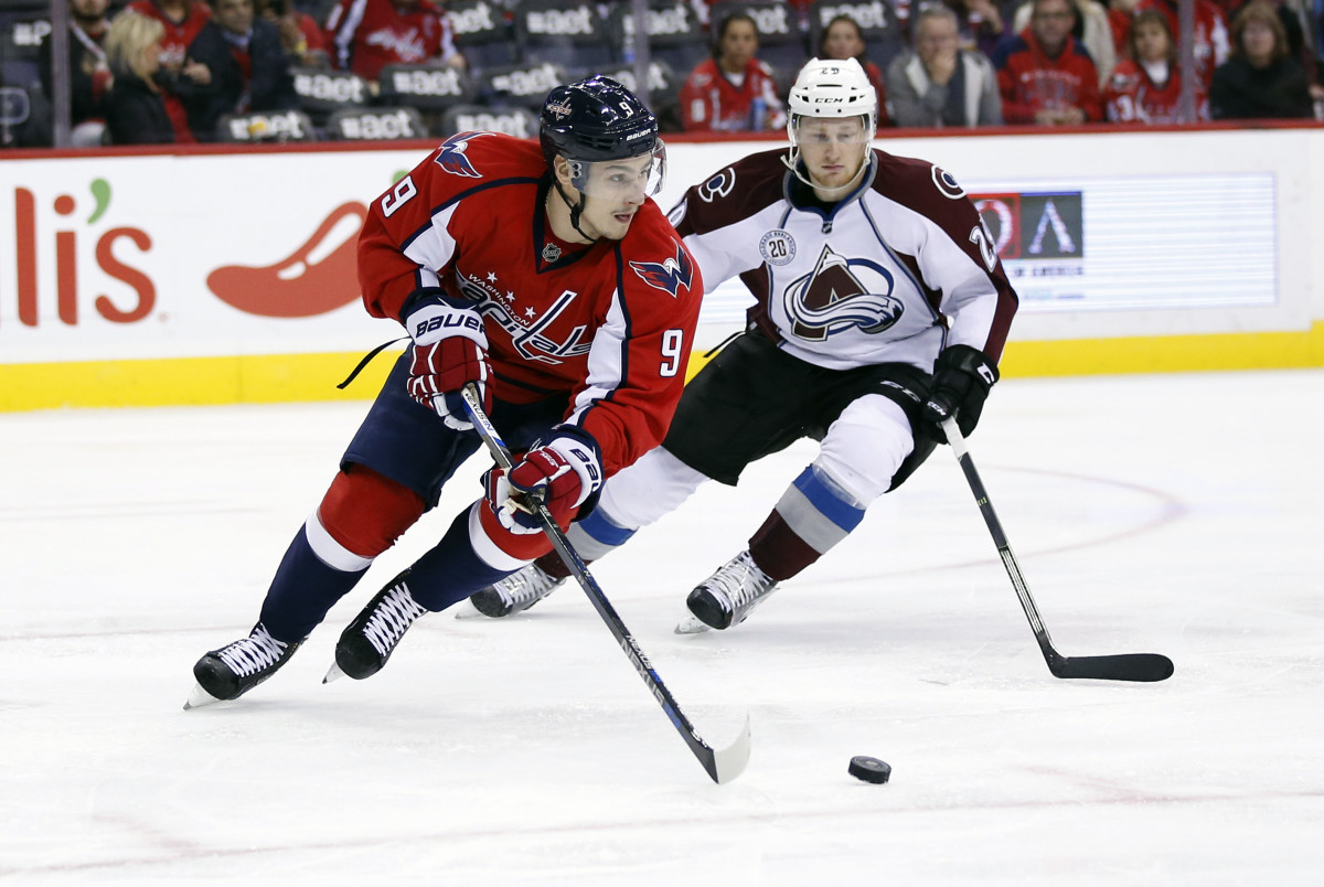Capitals score 4 in first, beat Avalanche 7-3 - Sports Illustrated