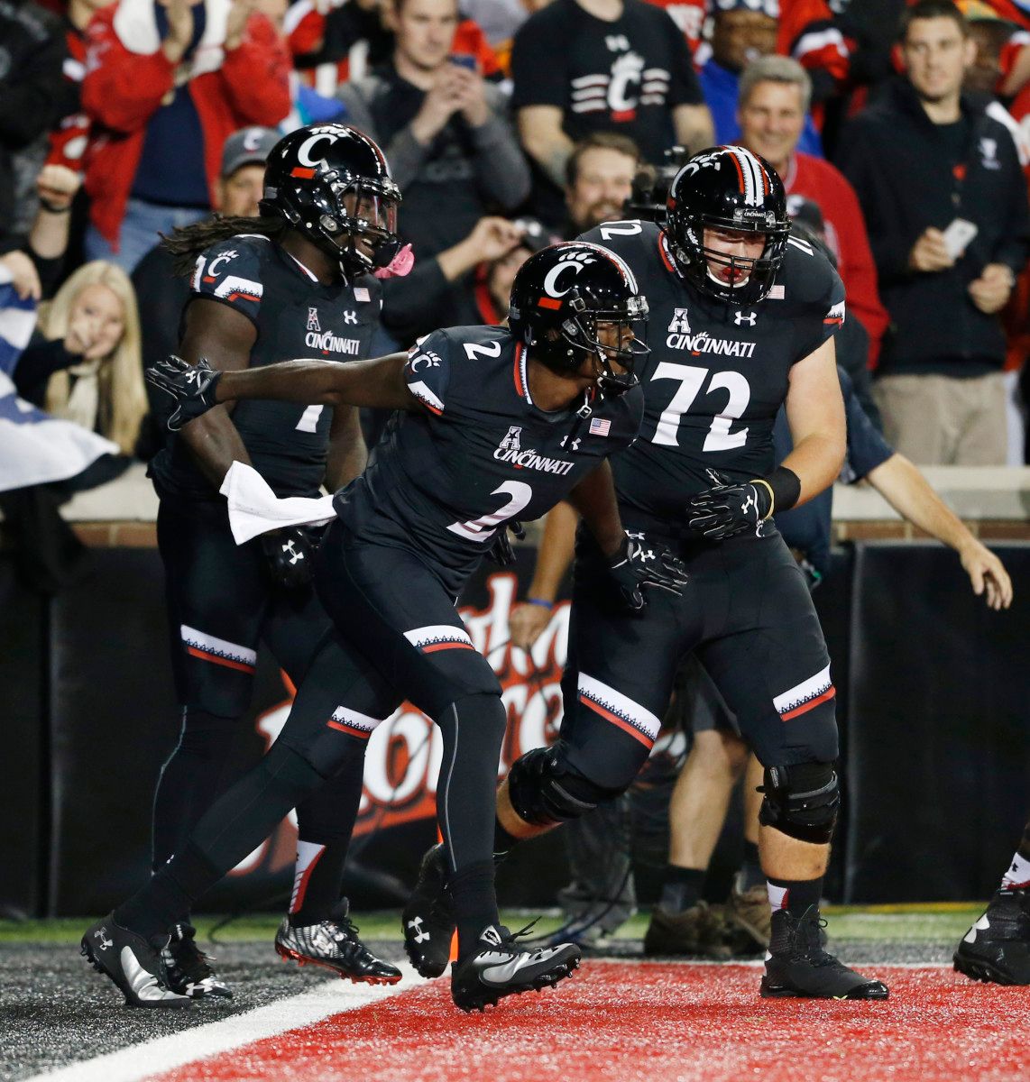 Moore throws for 2 TDs, Cincinnati beats Miami 34-23 - Sports Illustrated