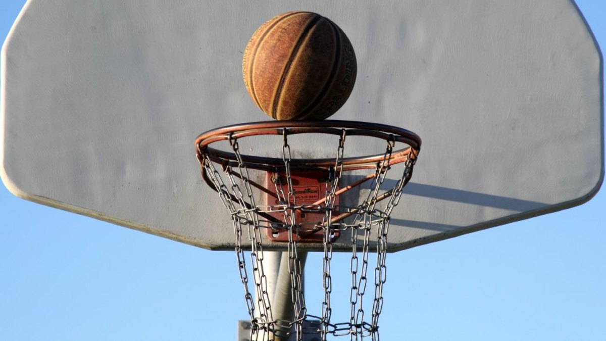 Kid can’t stop celebrating long distance trick shot - Sports Illustrated