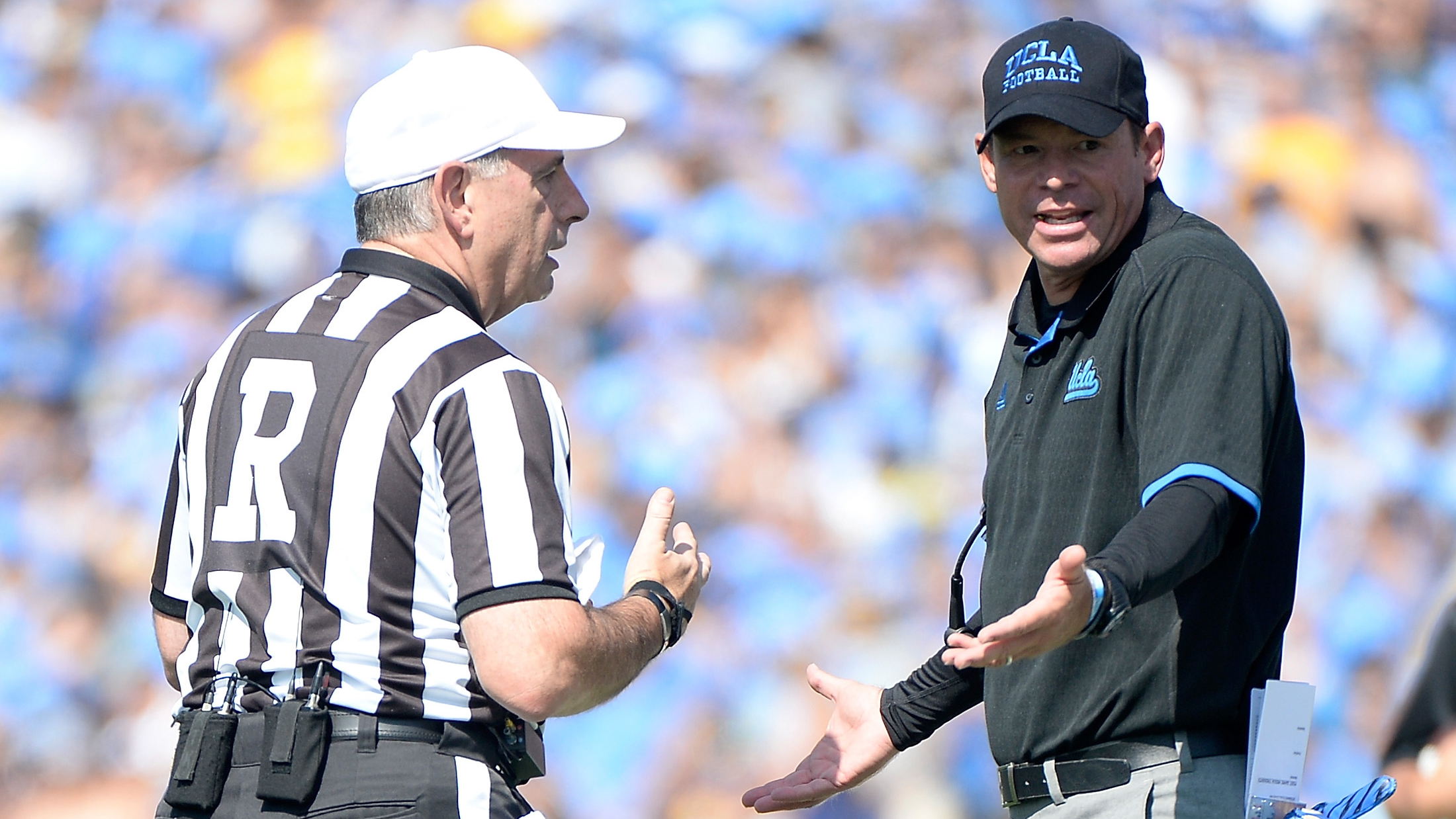 UCLA coach Jim Mora Jr. drops F-bomb while rallying fans - Sports ...