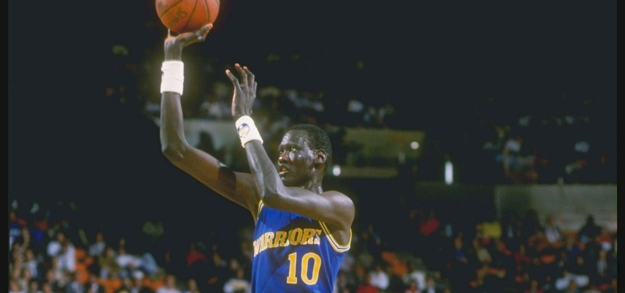 #tbt: Manute Bol was very, very tall - Sports Illustrated