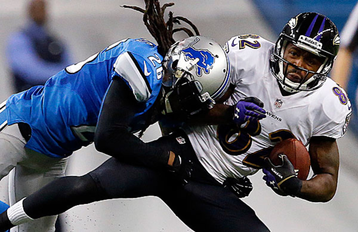 Detroit Lions cut Louis Delmas, Nate Burleson - Sports Illustrated