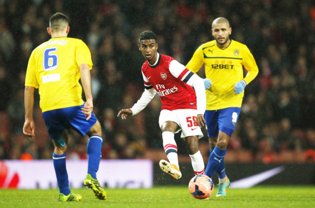 Podolski brace sees Arsenal through to FA Cup final 16; Zelalem debuts ...