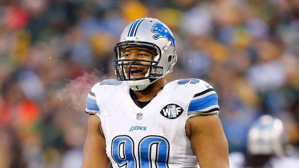 Suh blames numb feet on Rodgers leg stomp - Sports Illustrated