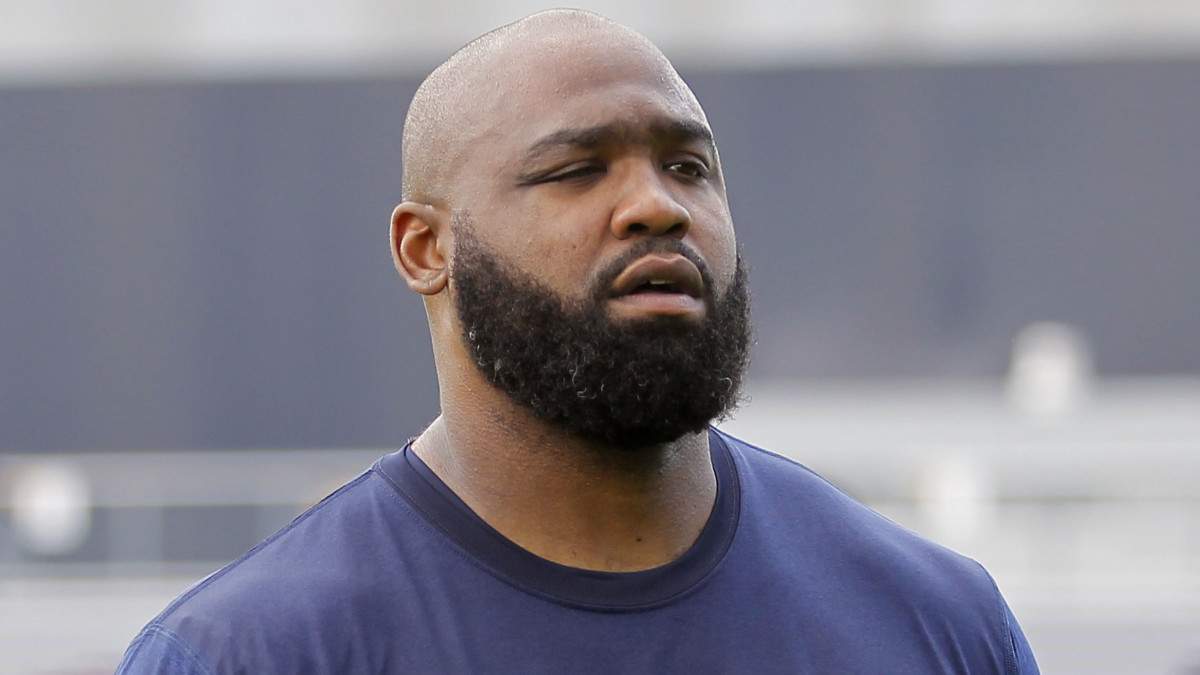 Arizona Cardinals sign defensive lineman Tommy Kelly - Sports Illustrated