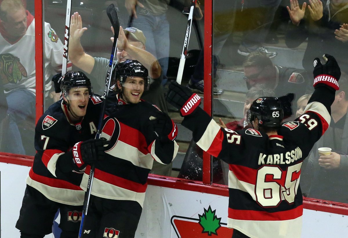 Hoffman scores in OT to lift Senators past Blackhawks, 4-3 - Sports ...