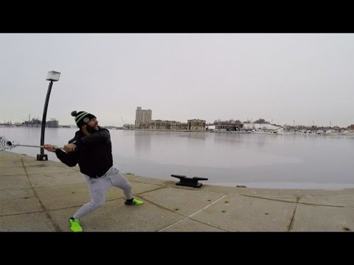 Video: Paul Rabil throws lacrosse ball over Balitmore Harbor - Sports ...