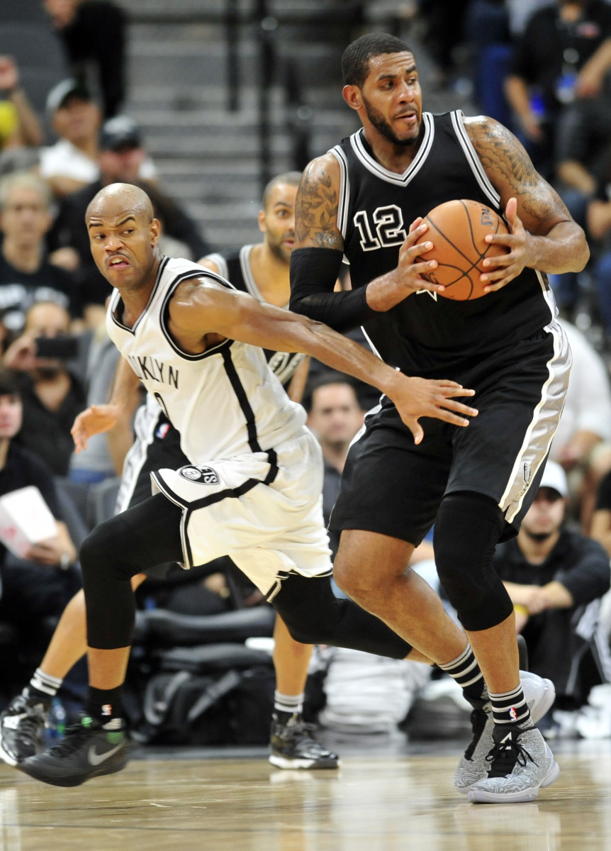 Leonard, Duncan lead Spurs to 102-75 win over Nets - Sports Illustrated