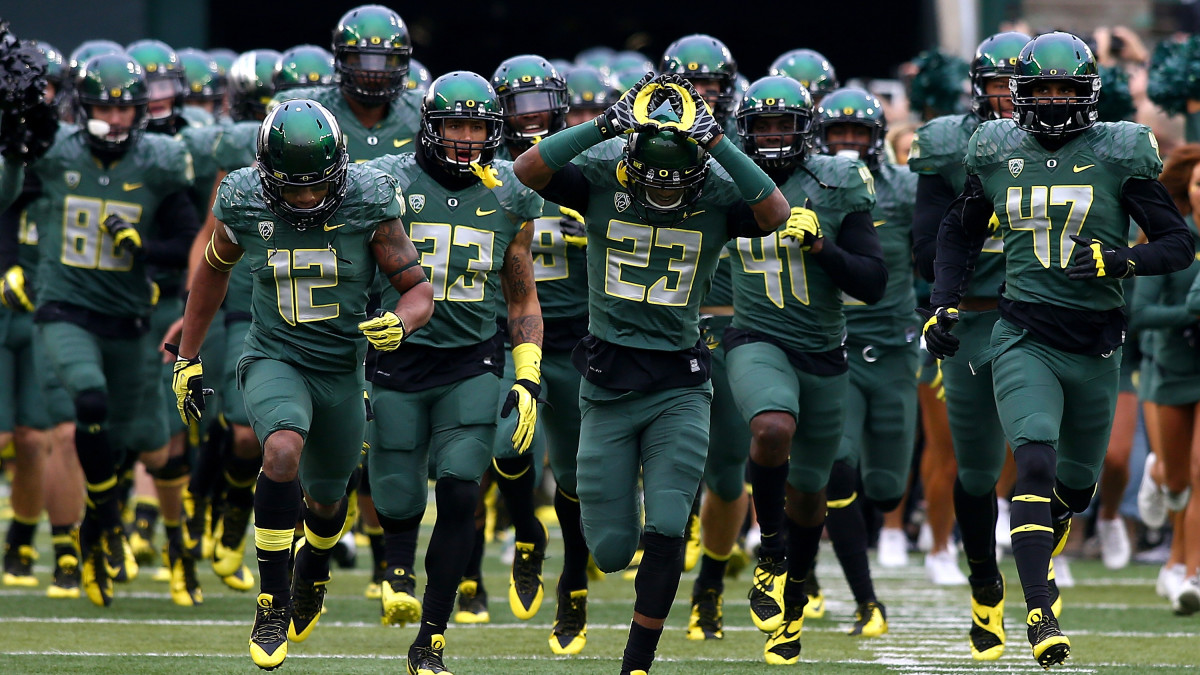Oregon football teases glow-in-the-dark uniforms for 2015 - Sports ...
