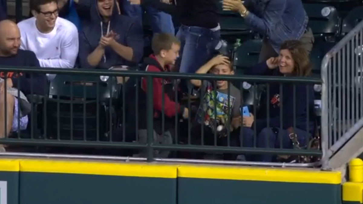 Tigers fan has emotional roller coaster after catching A's HR - Sports ...