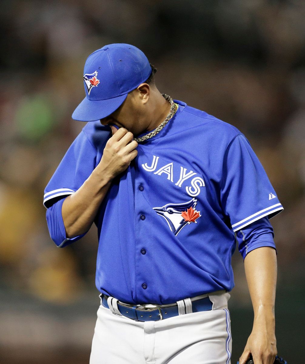 Davis beats out infield single in 10th as A's top Blue Jays - Sports ...