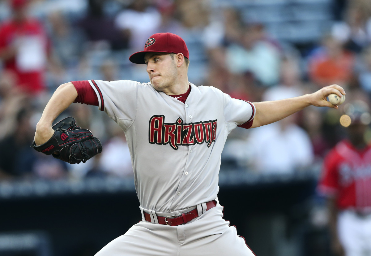 Corbin allows only 3 hits, Diamondbacks hold off Braves 8-4 - Sports ...