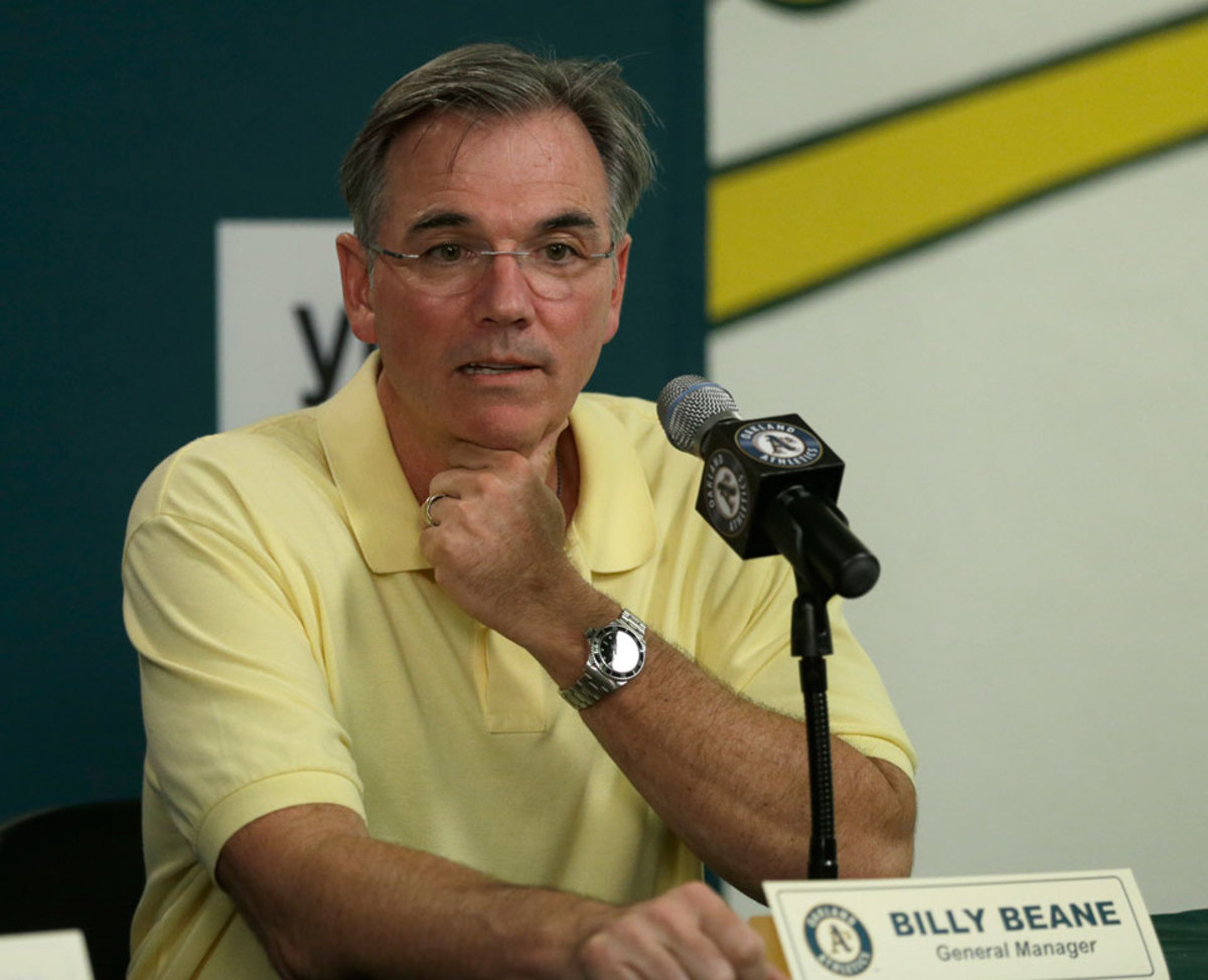 A's promote Billy Beane to VP of baseball operations, Forst to GM ...
