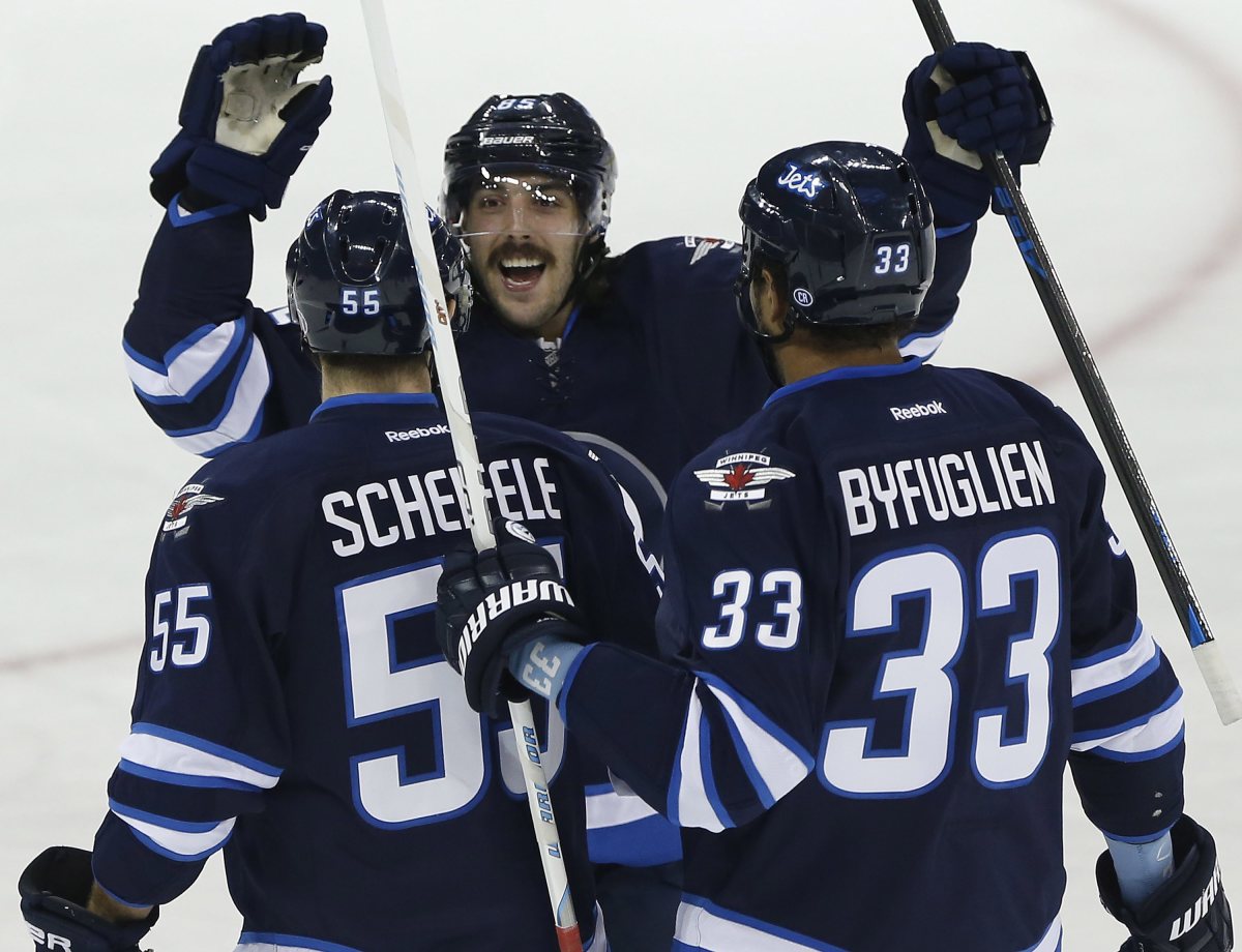 Jets end 6-game skid by beating Canucks 4-1 - Sports Illustrated