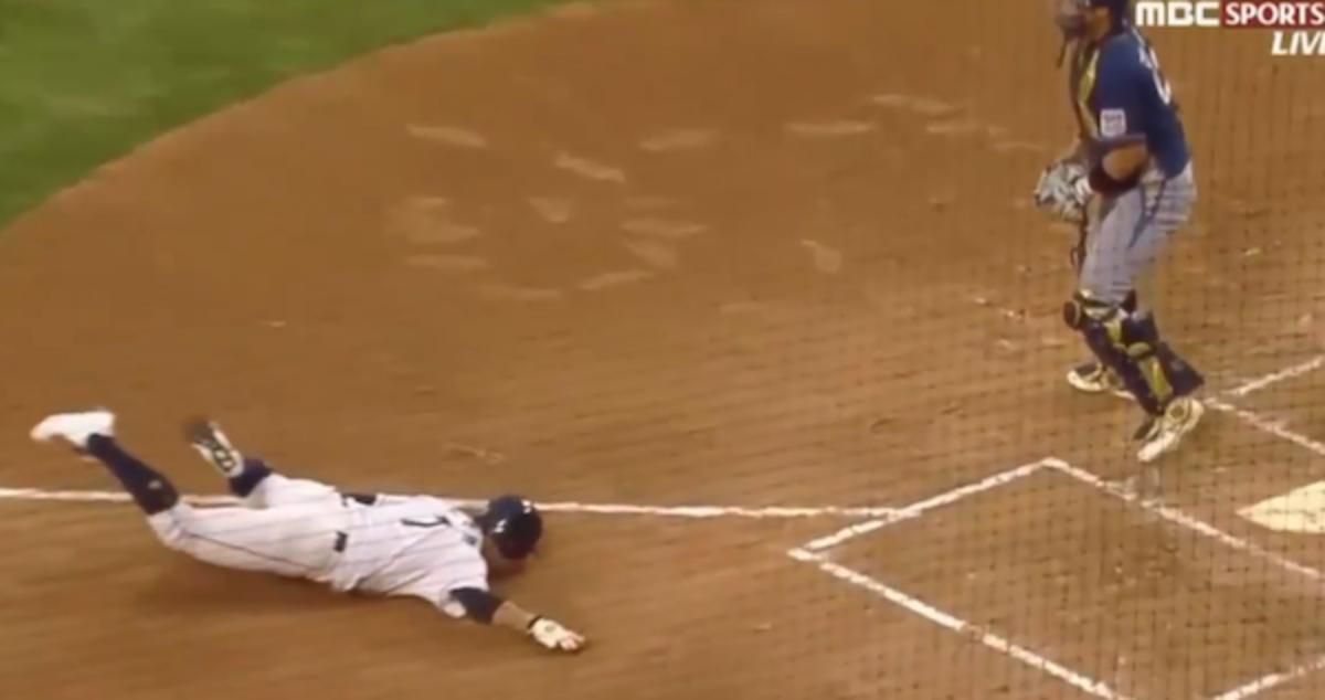 KBO player tries, fails to slide into home - Sports Illustrated