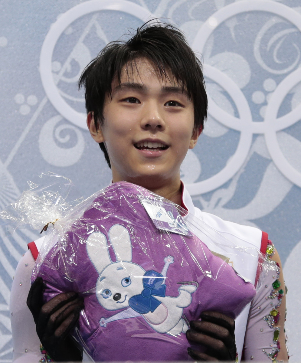Japan celebrates Hanyu's history-making gold medal - Sports Illustrated