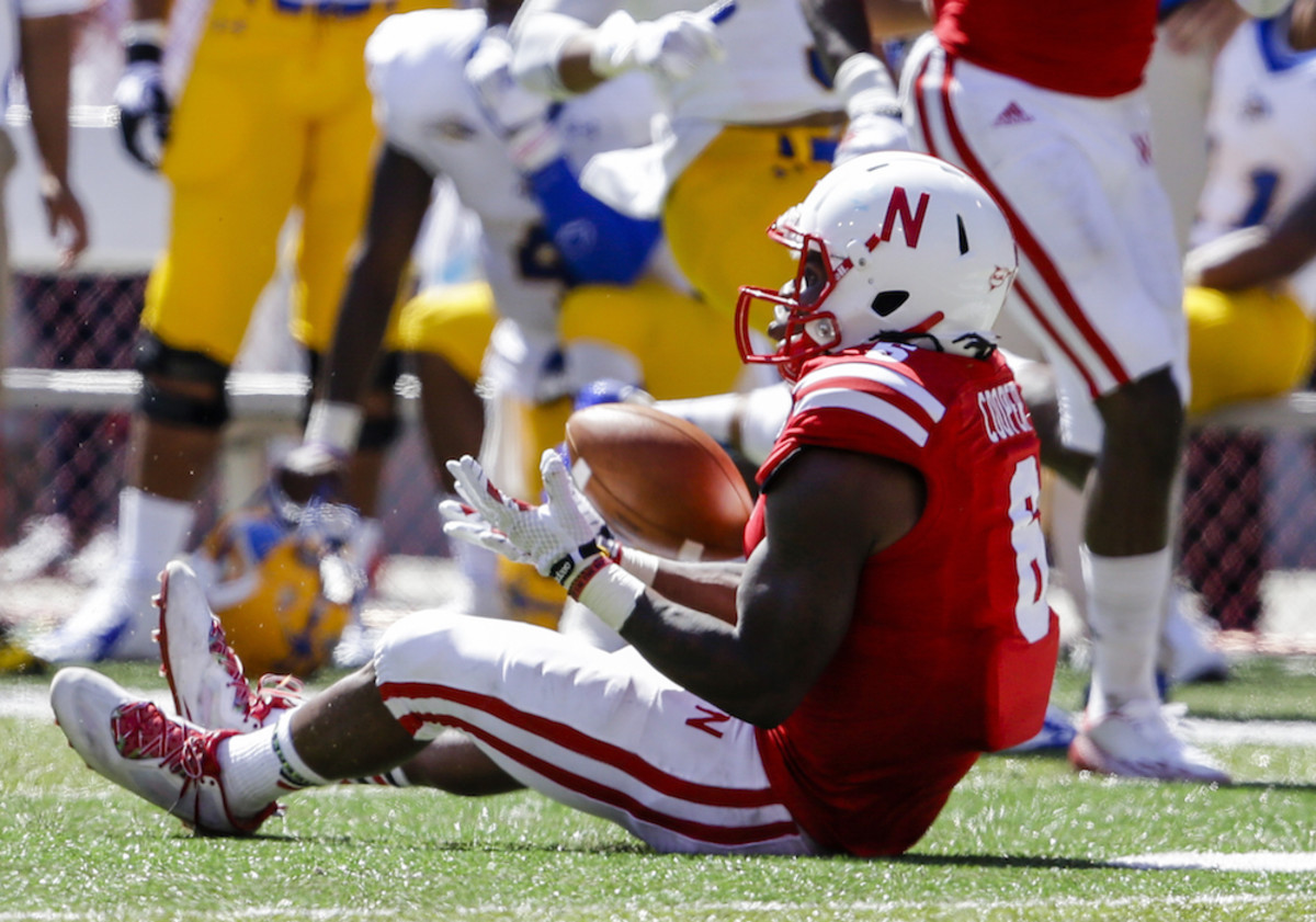 Nebraska S Corey Cooper vomits on field, keeps playing - Sports Illustrated