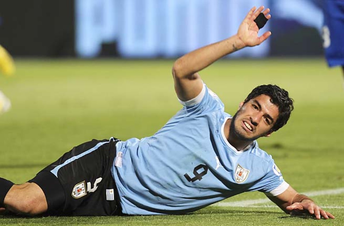 Luis Suarez escapes punishment for World Cup qualifier punch - Sports ...