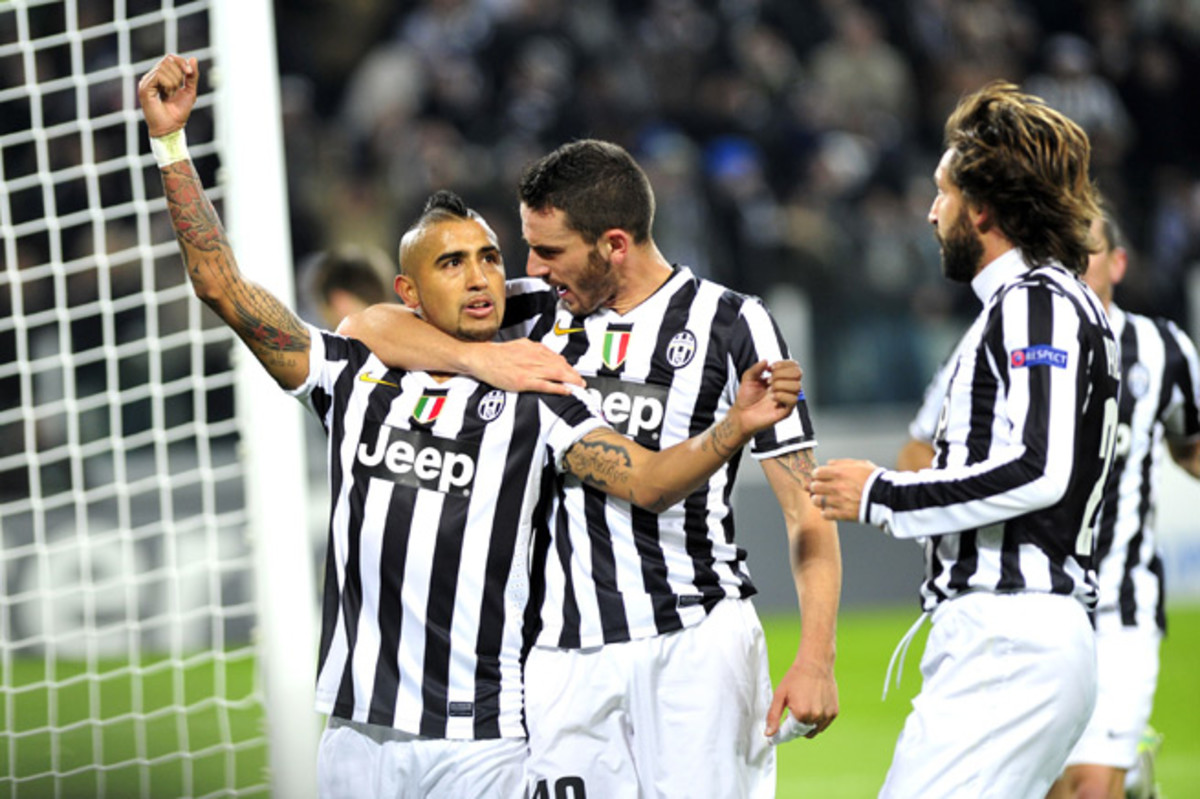Vidal hat trick lifts Juventus to 2nd in Champions League group ...