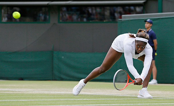 Wimbledon Day 8 photos: Women set semifinals full of surprises - Sports ...