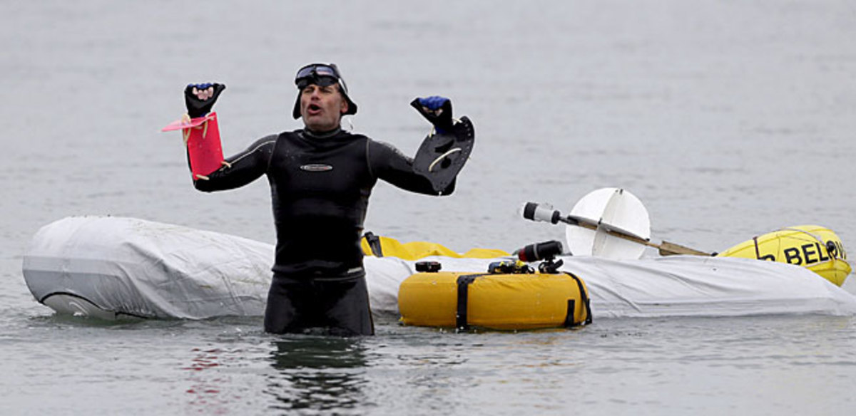 Man, 49, swims to Detroit while hauling bricks - Sports Illustrated