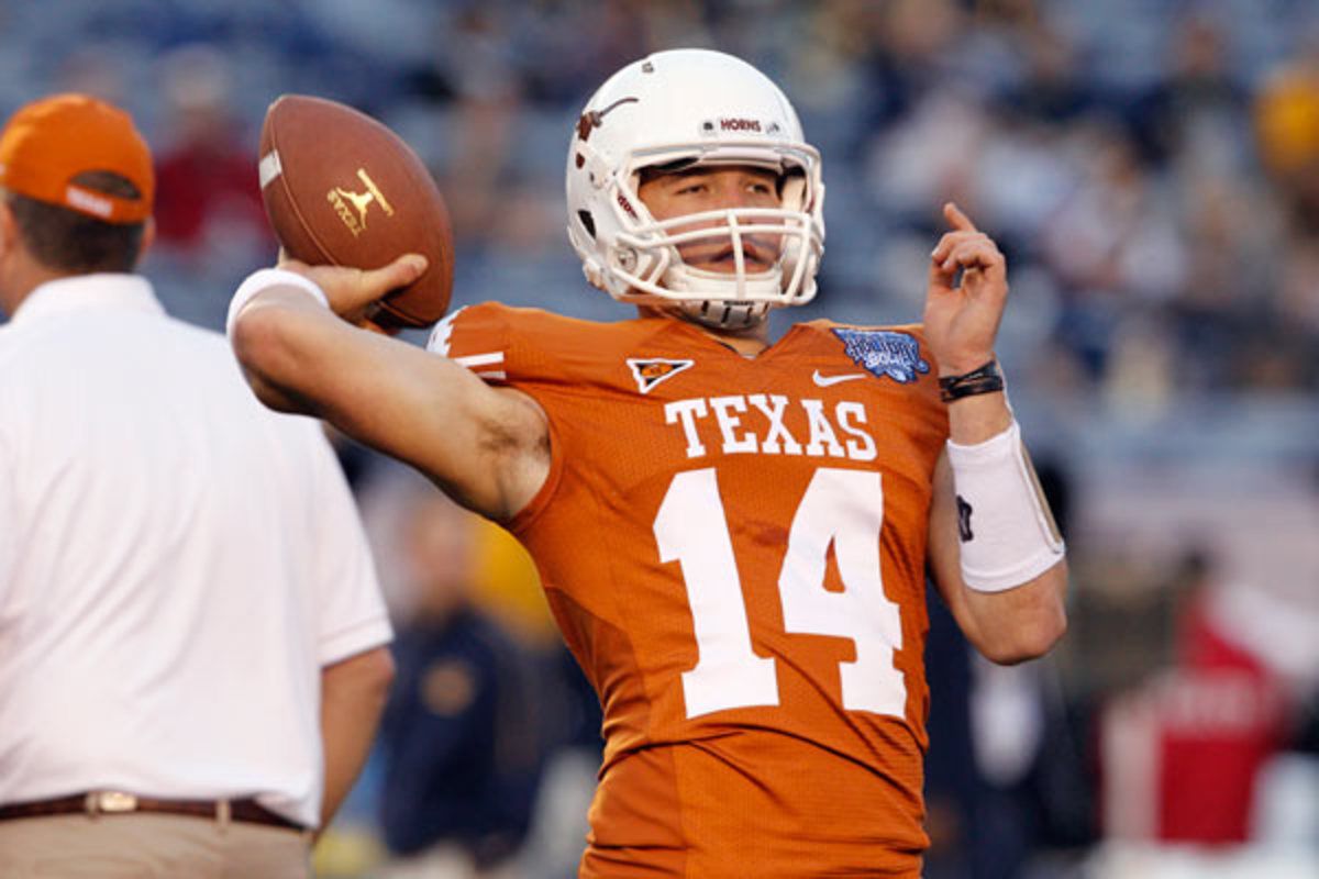 Texas quarterback David Ash (head) out for second half against Kansas ...