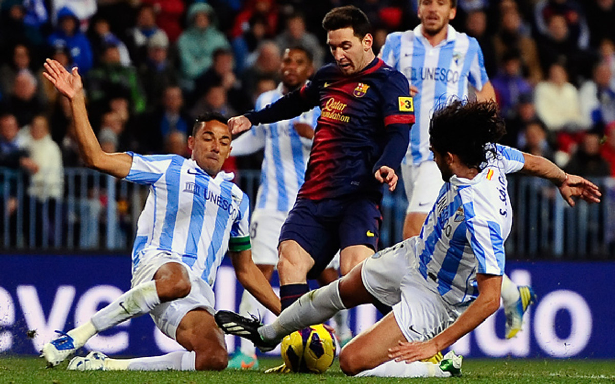Messi does it all as Barcelona rolls at Malaga - Sports Illustrated