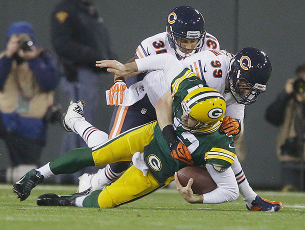 Aaron Rodgers injures left shoulder early in game against Bears - Sports Illustrated