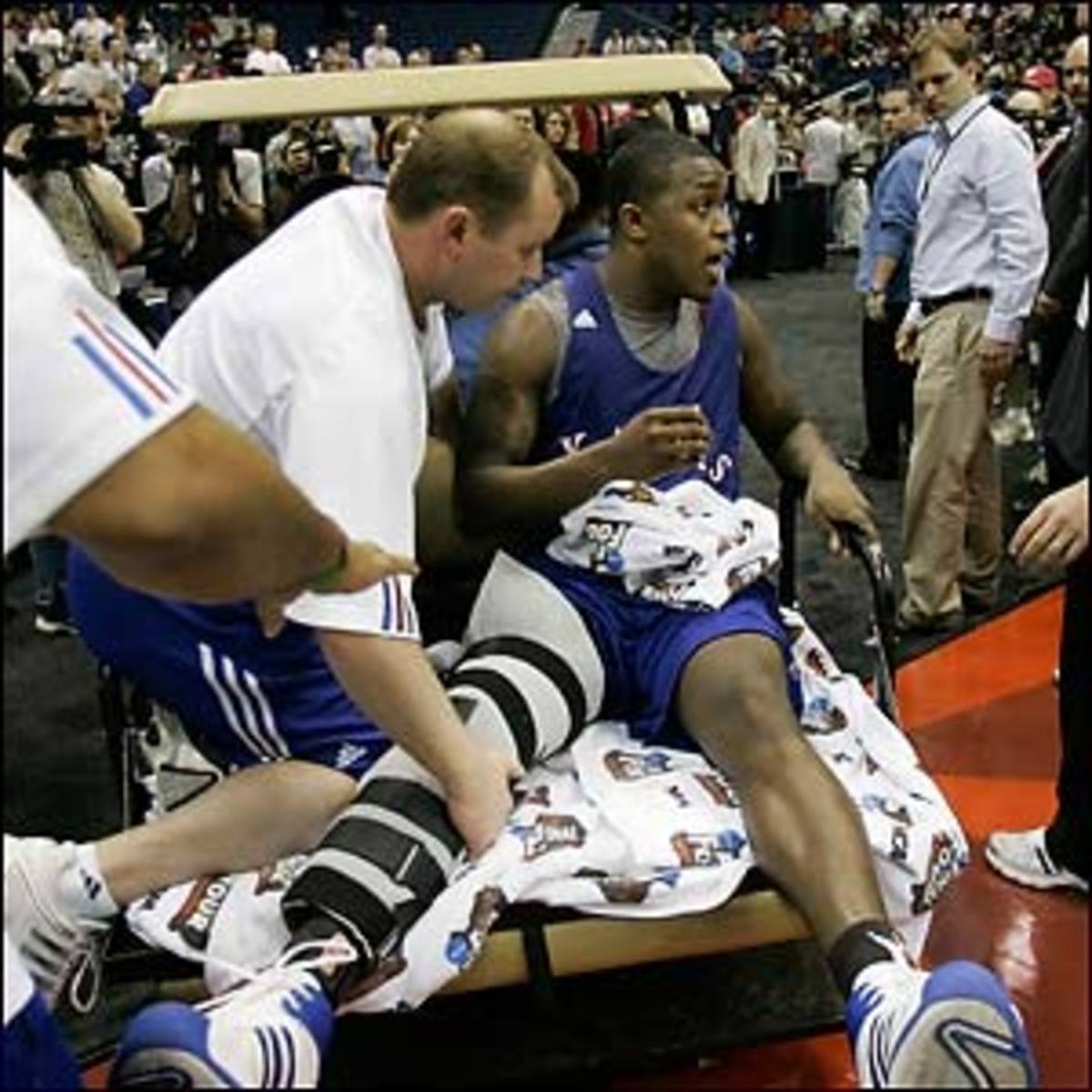 Stewart Mandel: Kansas backup injures right leg during Final Four open ...