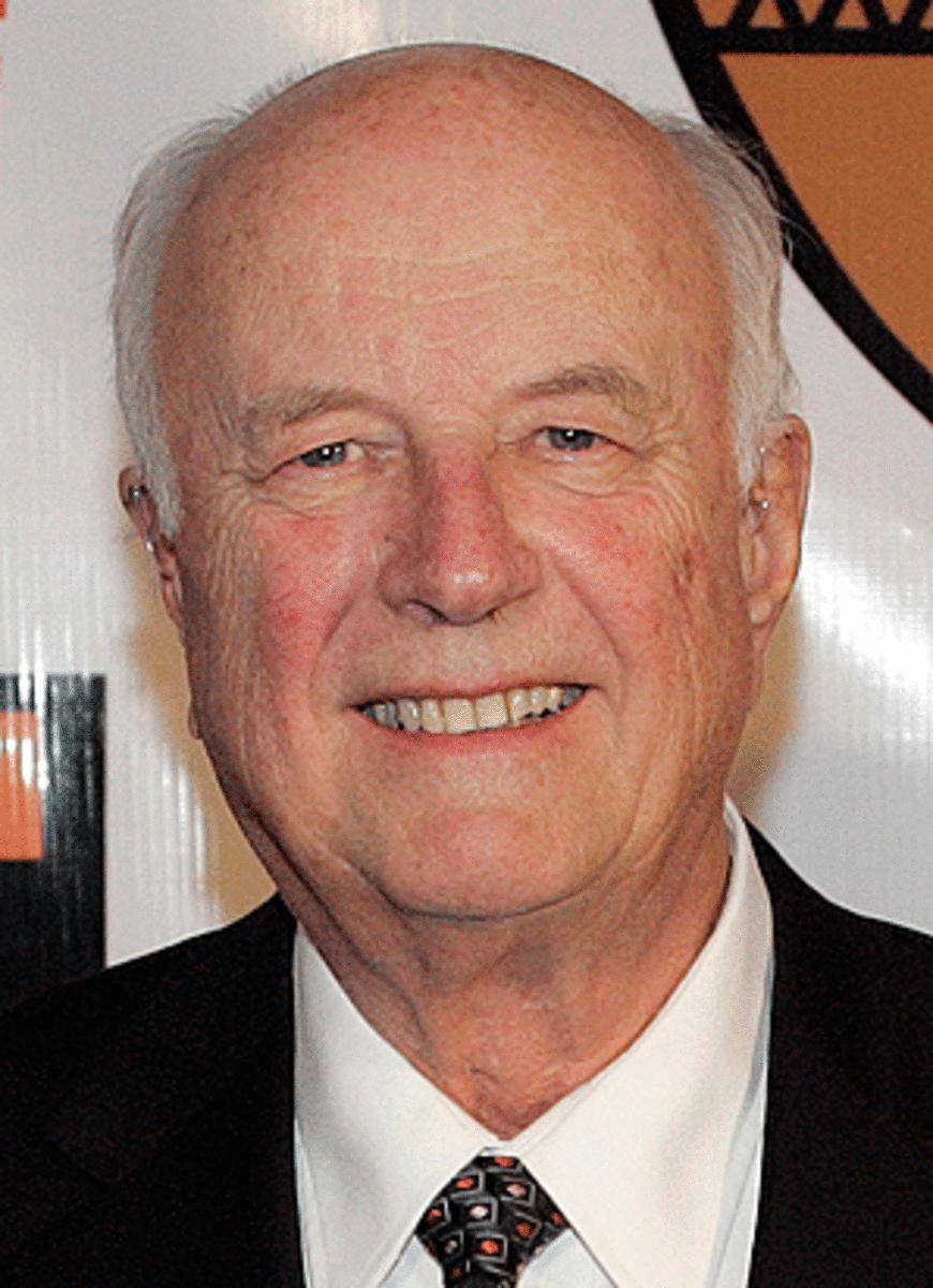 Designated Read: Chuck Neinas to jump out of giant purple cake - Sports ...