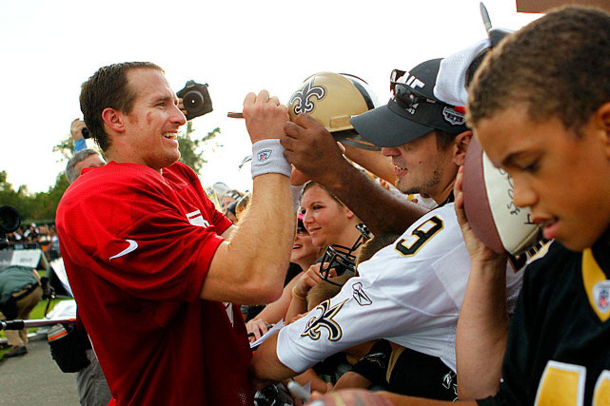 NFL Players with Fans at Training Camp - Sports Illustrated