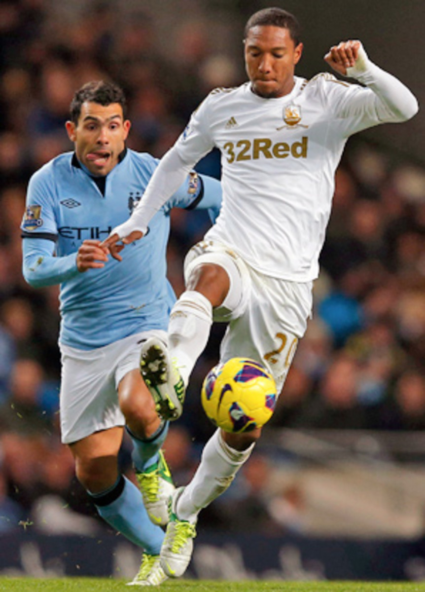 England: Arsenal, Man City win - Sports Illustrated