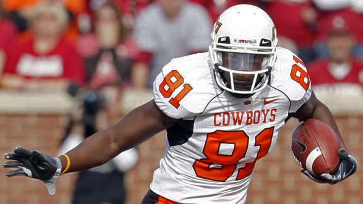 Oklahoma Sooners' Tommie Harris, Oklahoma State Cowboys' Justin ...