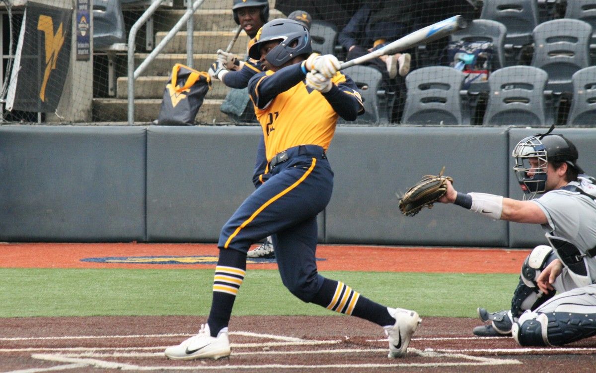 Mountaineers Extinguish Flames - Sports Illustrated West Virginia ...