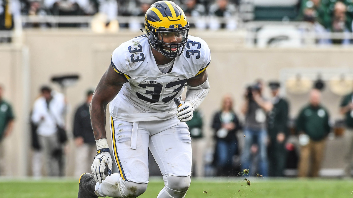 Former Michigan football star Taco Charlton signs with the San ...