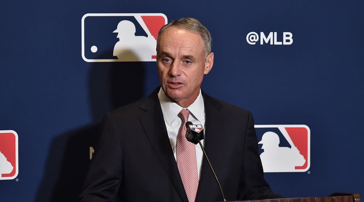 After months of negotiations between Major League Baseball players and ...