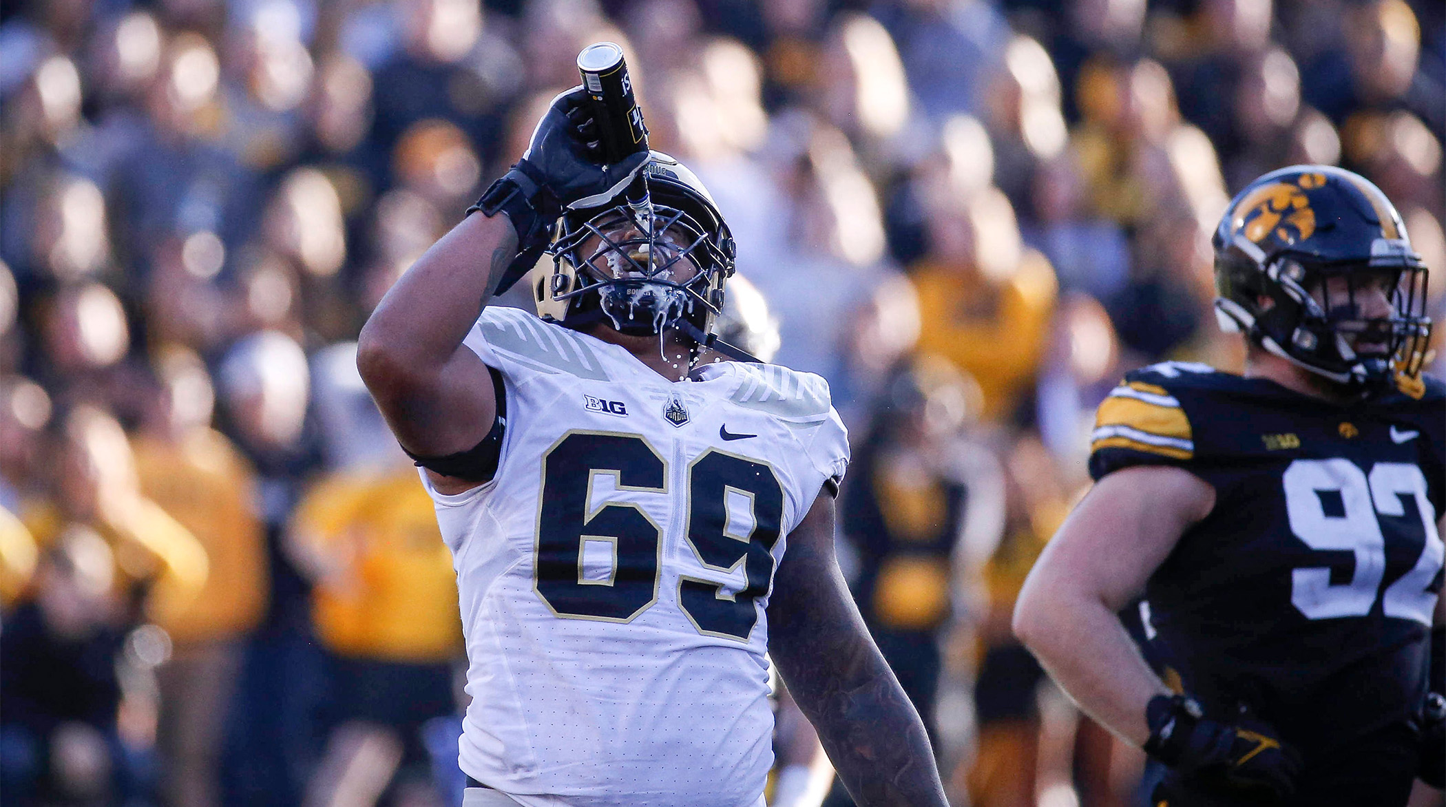 Purdue-Iowa: Greg Long gives new meaning to 'hold my beer' in third ...
