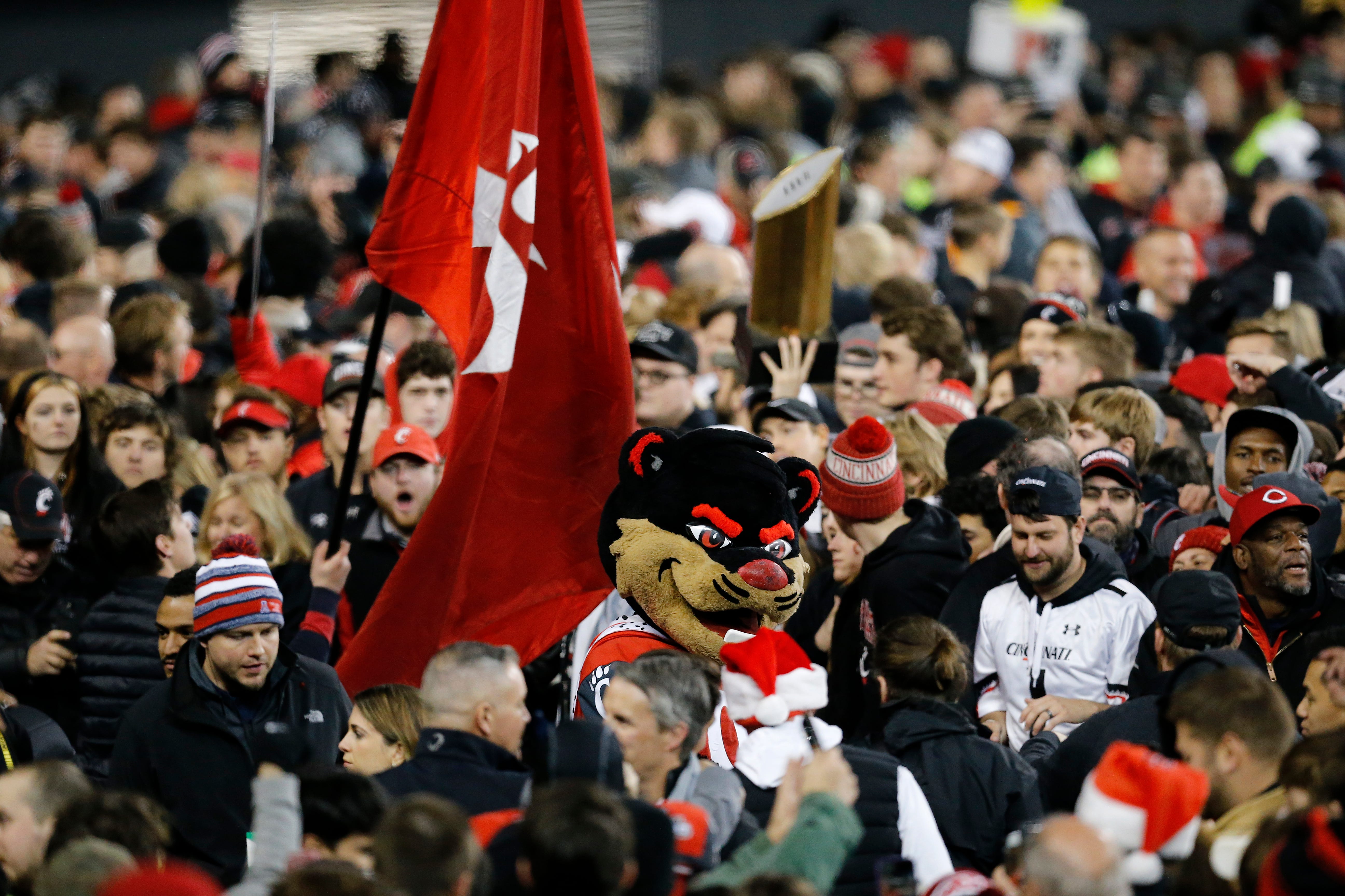 Look: Best Moments From UC Fans Storming the Field at Nippert Stadium ...