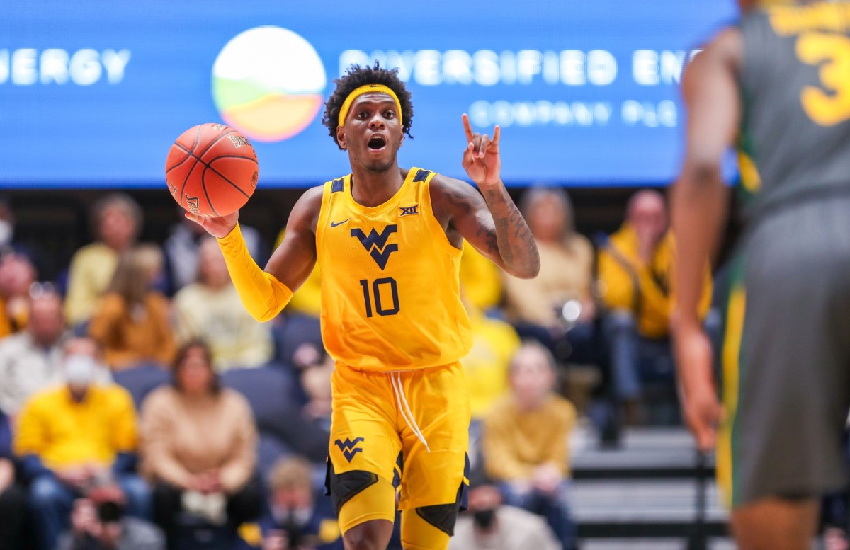 Spread & Over/Under Predictions for WVU vs Iowa State - Sports ...