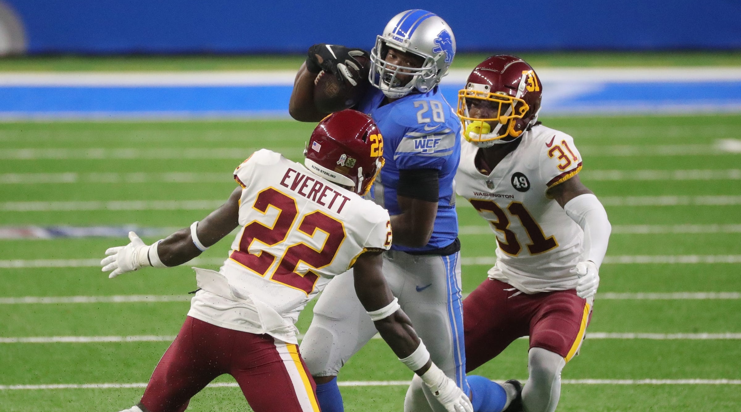 Washington's Deshazor Everett turns himself in for involuntary ...