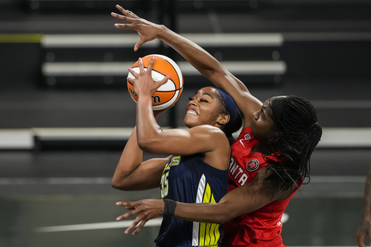 Four Former Texas Longhorns Tip Off WNBA Season - Sports Illustrated ...