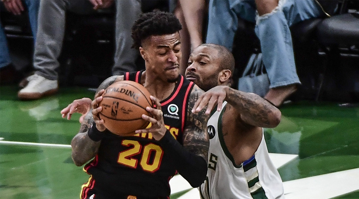 John Collins contract: Hawks ink five-year deal to keep power forward ...