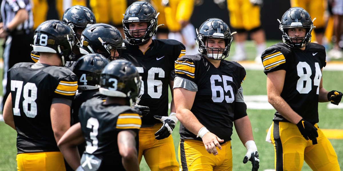 Opposing Sideline: Tyler Linderbaum Center of Attention on Iowa ...