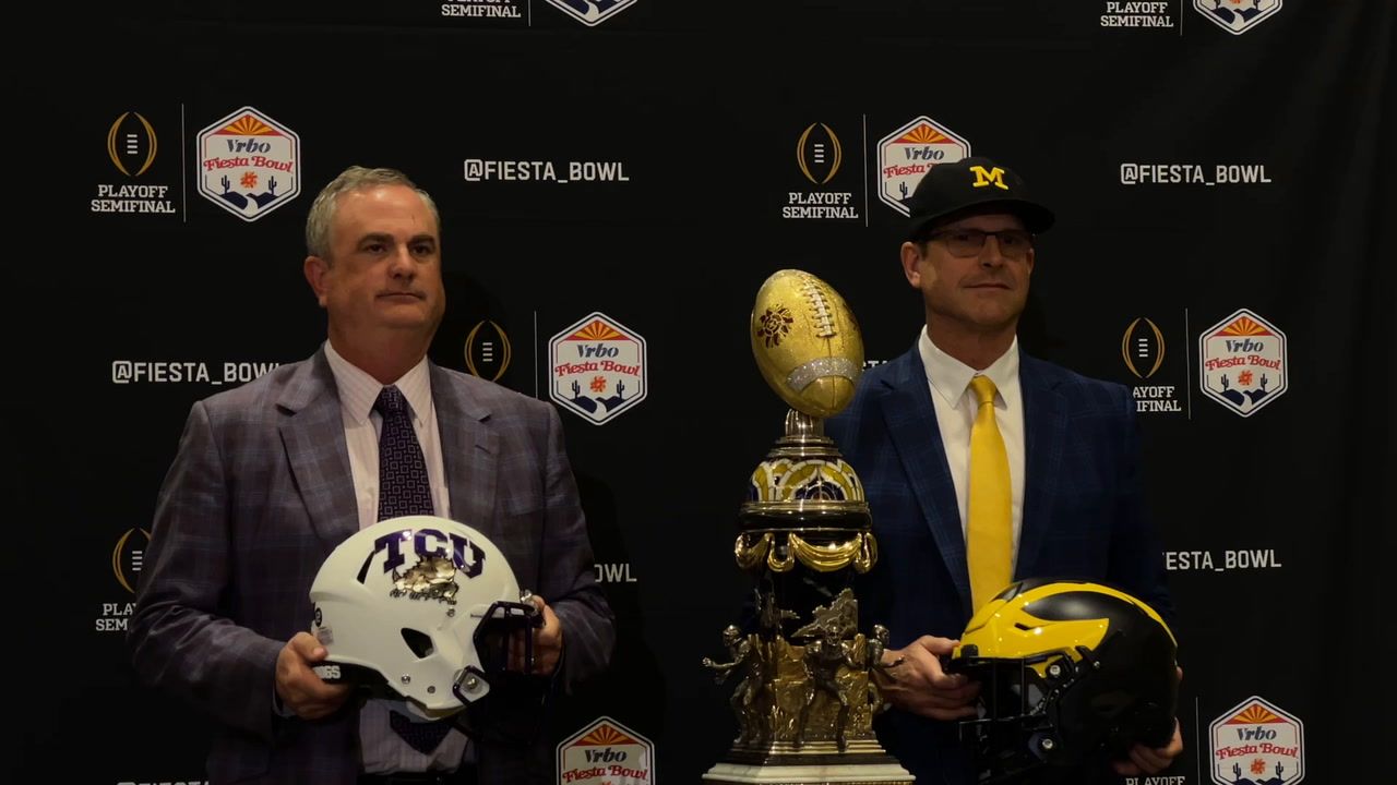 Coaches Sonny Dykes and Jim Harbaugh Pose with the Fiesta Bowl Trophy ...