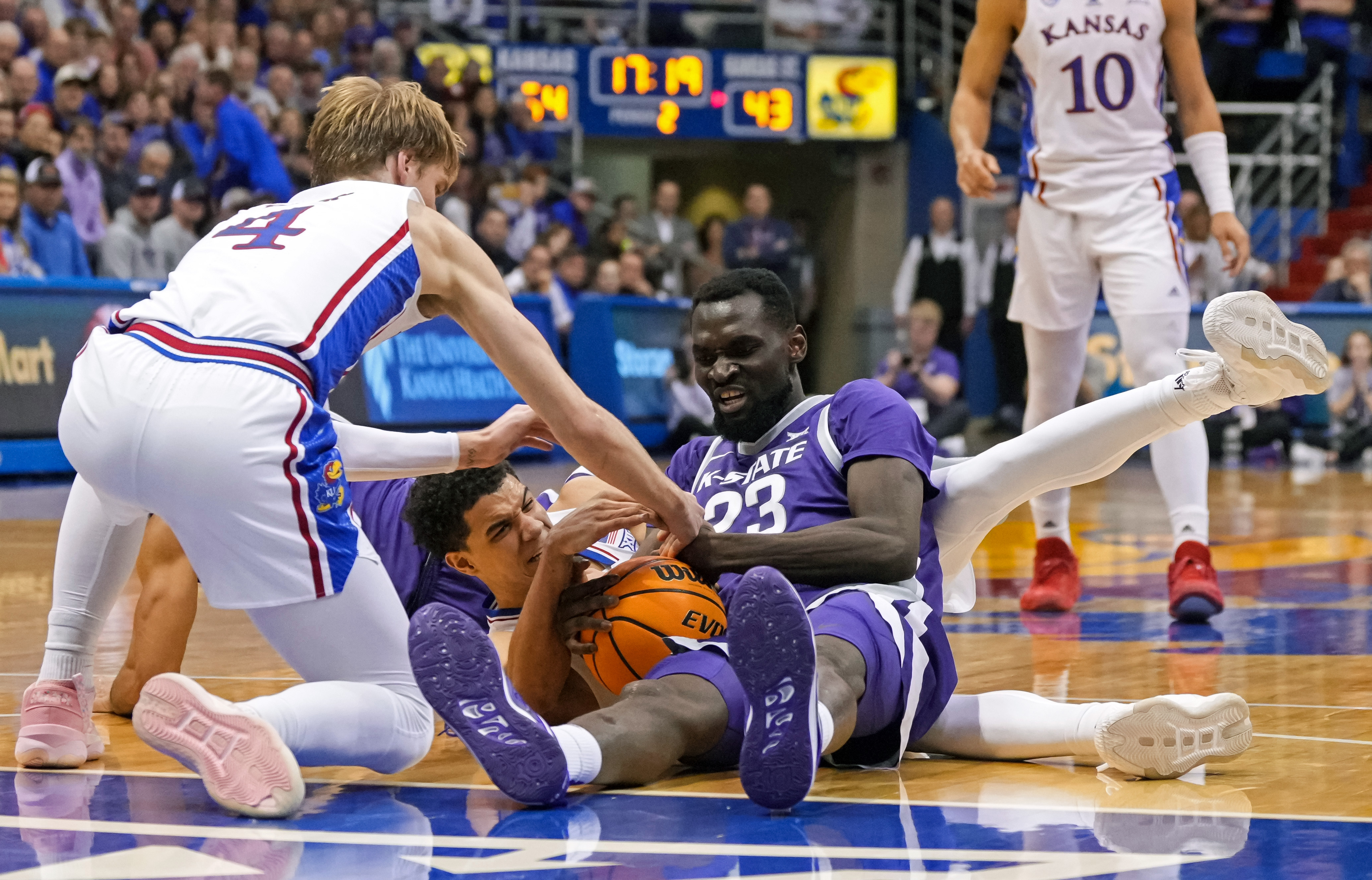 Kansas trio lead balanced effort to 90-78 win over Kansas State in foul ...