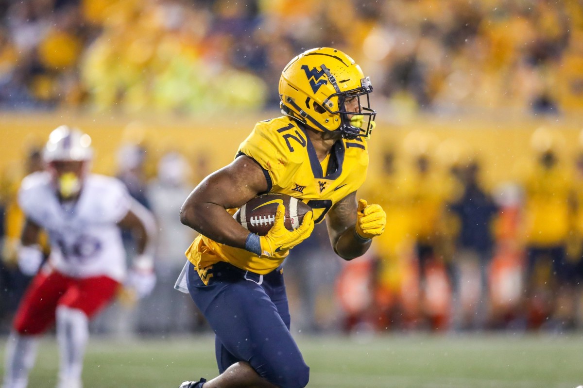CJ Donaldson Explains Decision to Return to WVU - Sports Illustrated ...