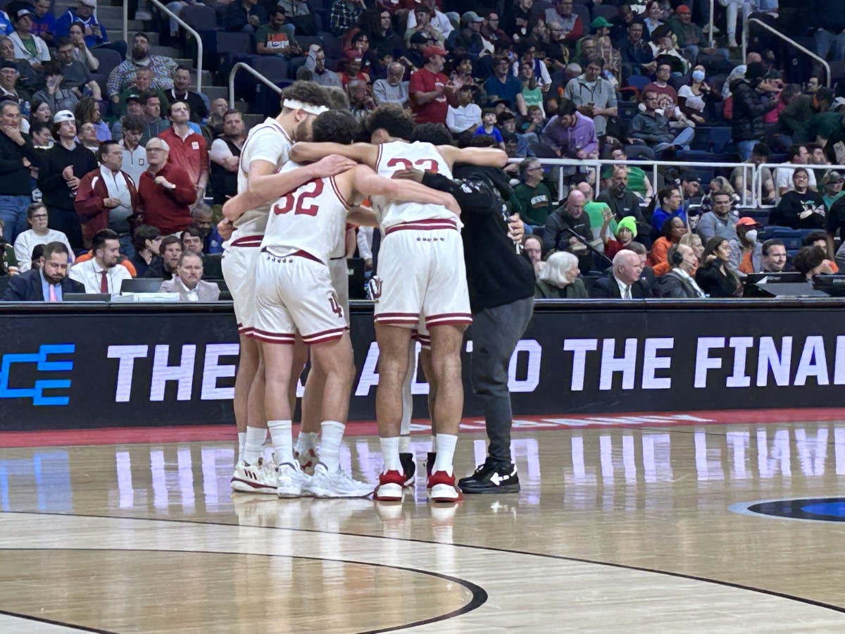 Photo of Xavier Johnson With Indiana Teammates Just Before Tipoff Goes ...