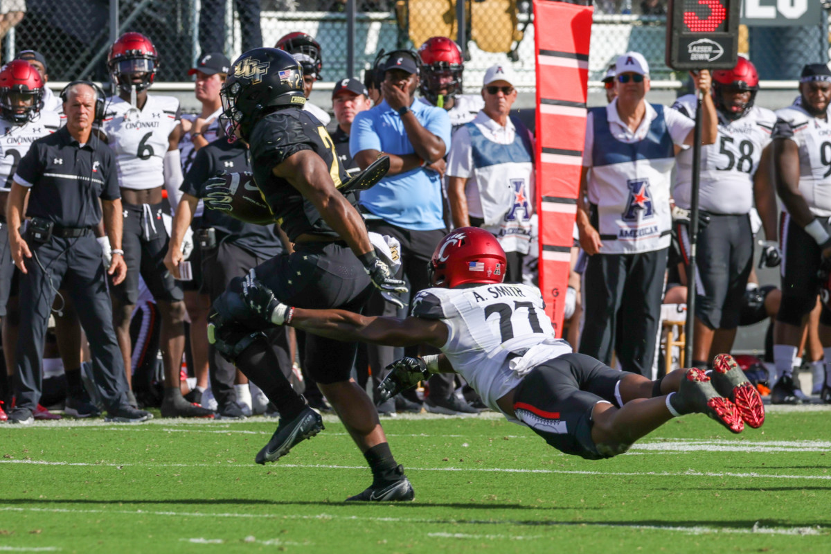 UC Football Safety Armorion Smith, Cornerback Malik Rainey Enter ...
