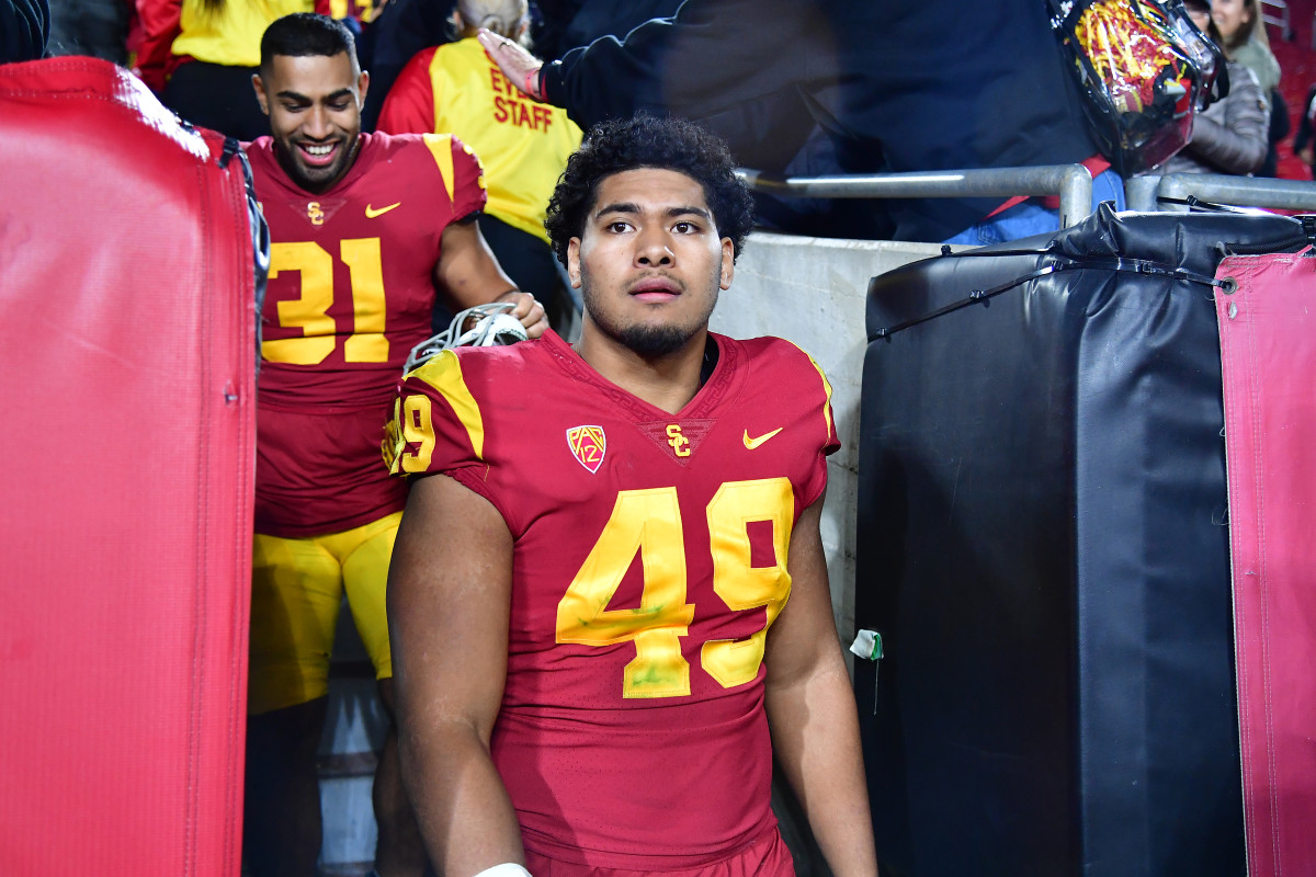 NFL Draft: Tuli Tuipulotu selected in second round by Los Angeles ...