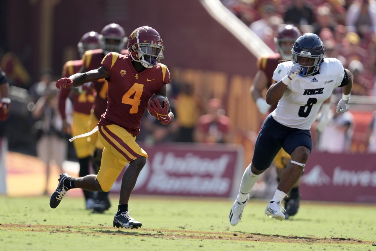 Photos: USC football explodes for 66-14 win over Rice in first game ...